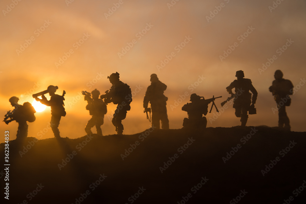 War Concept. Military silhouettes fighting scene on war fog sky ...