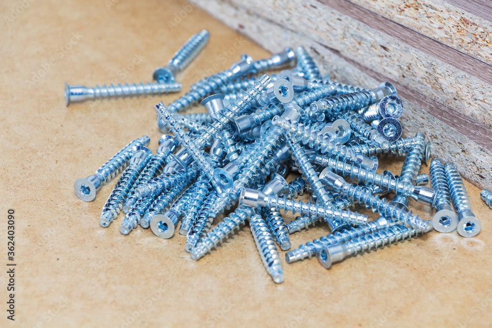 Screw-on for furniture. Metal screw. Vertical. Metal screws. Furniture ...