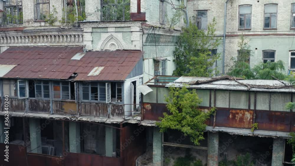 Abandoned ruined old manor (mansion) house with broken windows and ...