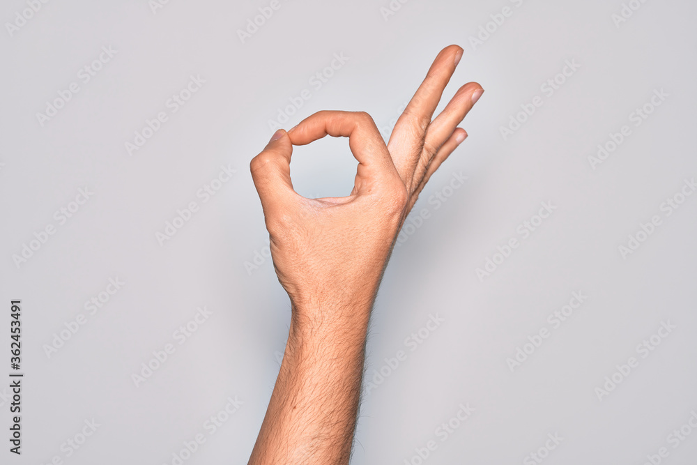 Hand of caucasian young man showing fingers over isolated white ...