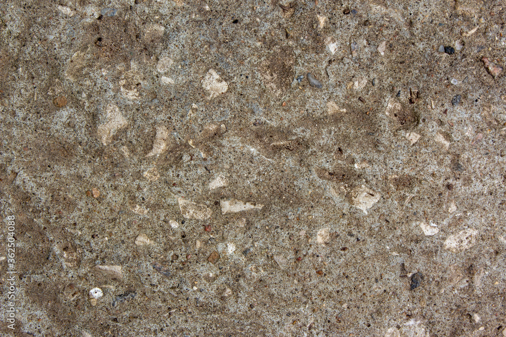 Muddy concrete wall with cracks and brown spots. Old and dirty tested ...