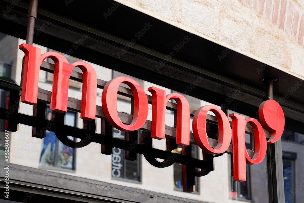 Monop sign logo of retail chain supermarket store in city center Stock ...