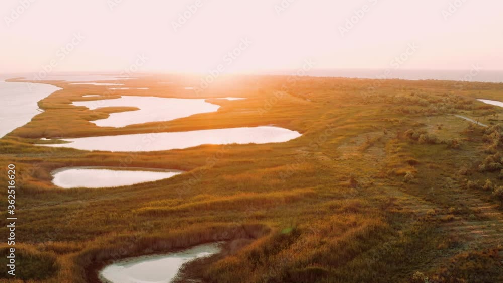 Aerial view of lakes and islets near Black Sea on backdrop of summer ...