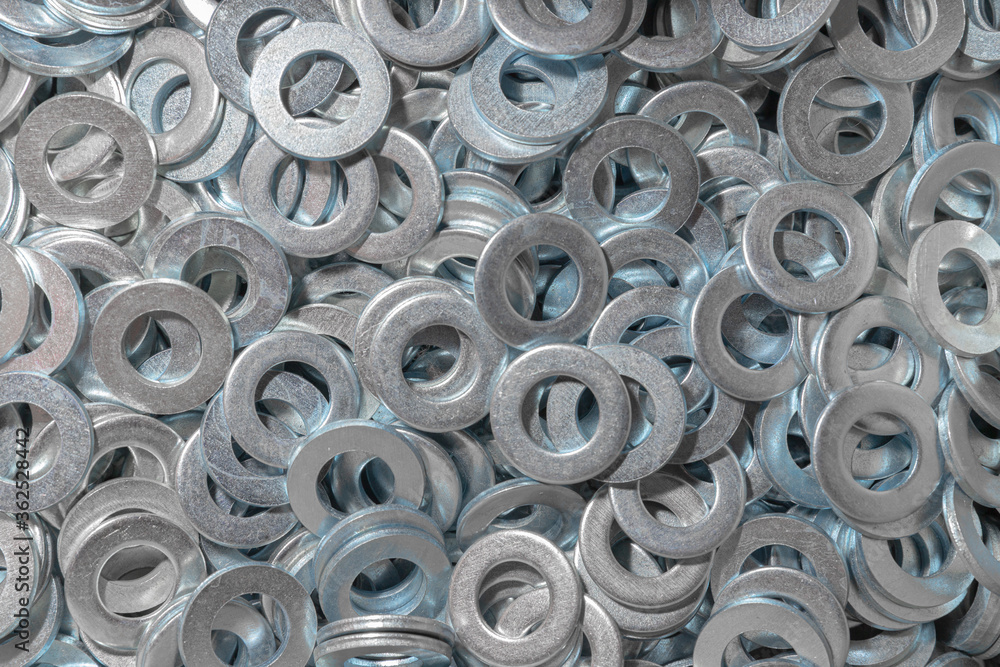 Washers for the bolt. Texture. Many washers for bolts and screws ...