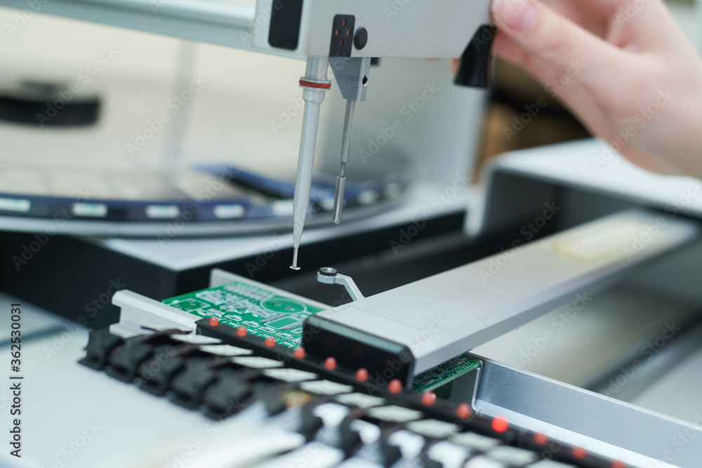 microchip semiconductor manufacturing. operator with machine robot ...