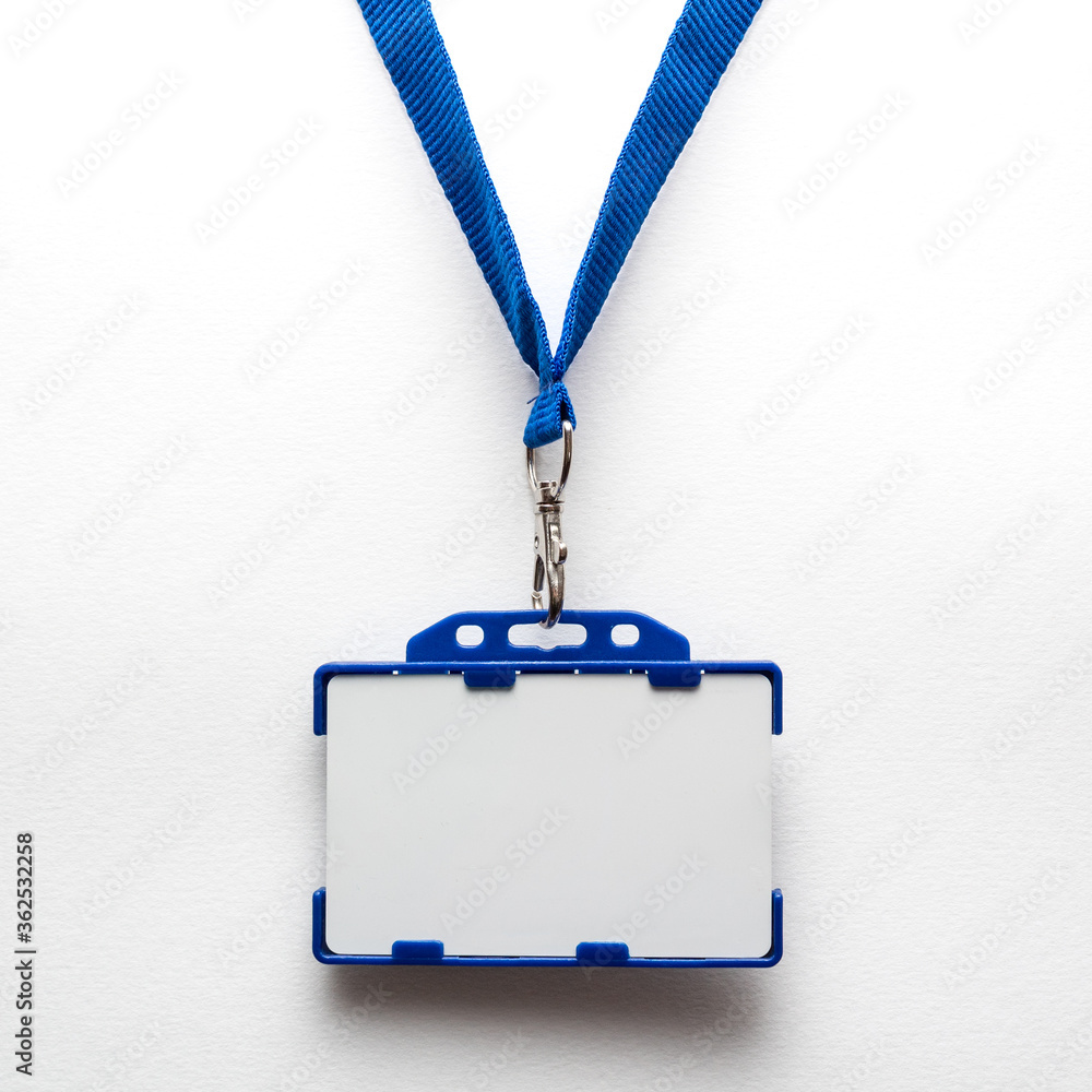 Blank name tag or identification badge on blue strap. White background ...