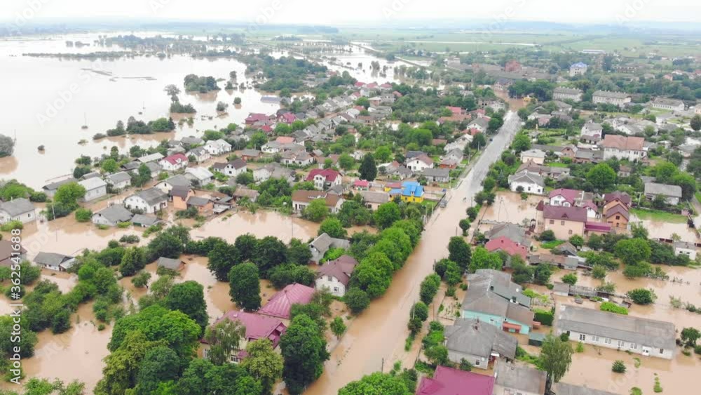 Aerial View from above on the flooded houses and the city. Flood after ...