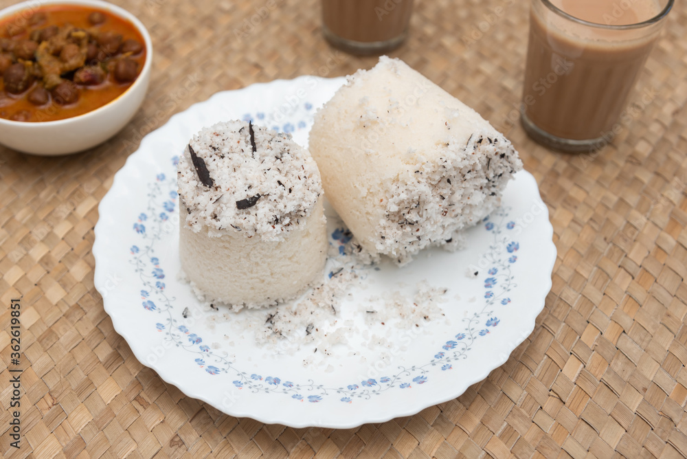 Popular South Indian breakfast puttu / pittu made of white rice flour ...