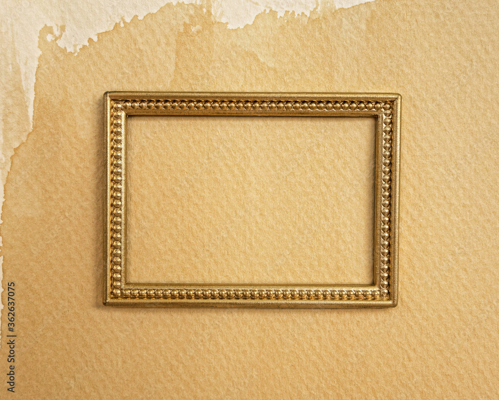 Golden frame border on aged wallpaper background. Stock Photo | Adobe Stock