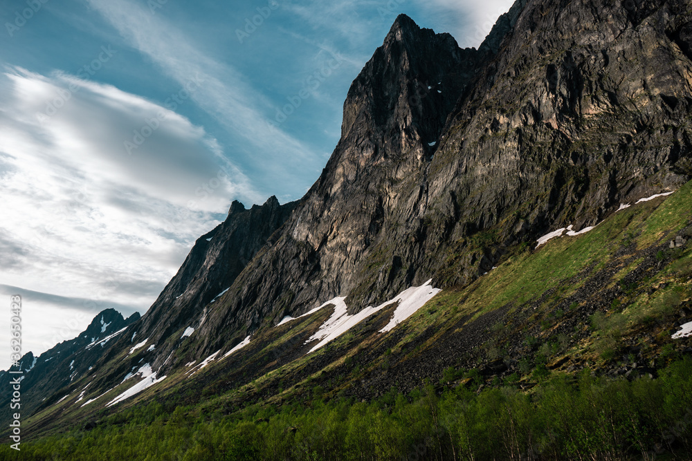 Sharp mountain peaks, Senja island, northern Norway. Fjord valley ...