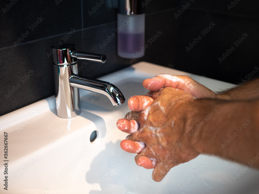 Hand washing personal hygiene man washing hands rubbing soap for 20 ...