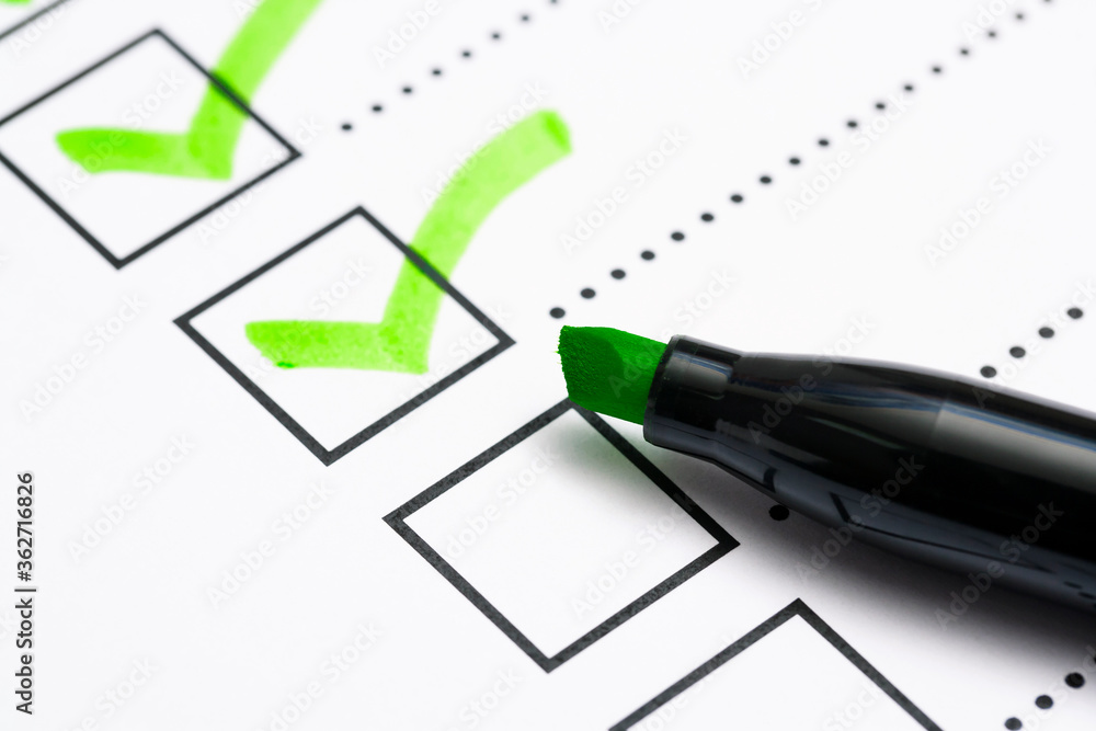 Check list and marker Stock Photo | Adobe Stock