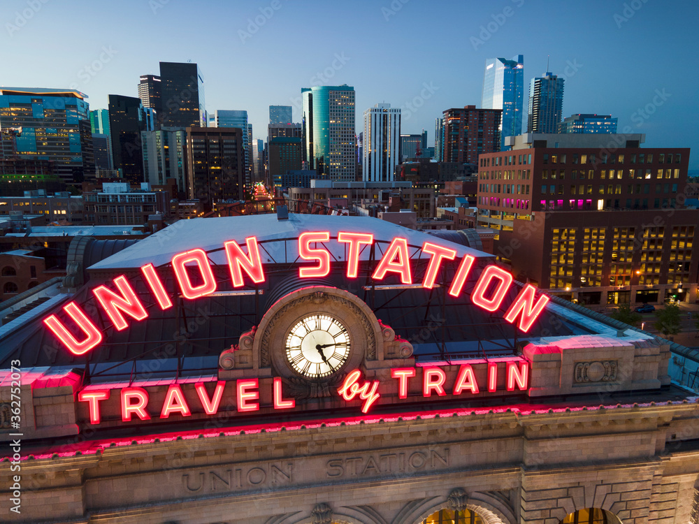 union station train station travel by train neon sign with clock and ...