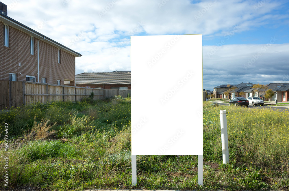 Blank white empty mockup template of a real estate sign at front of a ...
