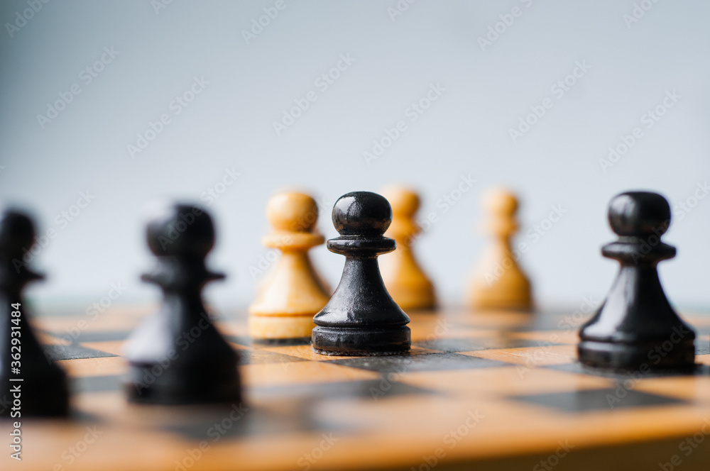 Face Off. Chess pieces knights facing each other for a standoff on ...