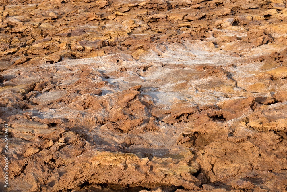 Salt ponds, bubbling chimneys and salt terraces form the bottom of the ...