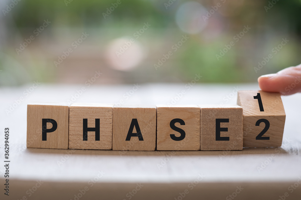 PHASE 1 2 reopen project plan concept on wood blocks as finger changes ...