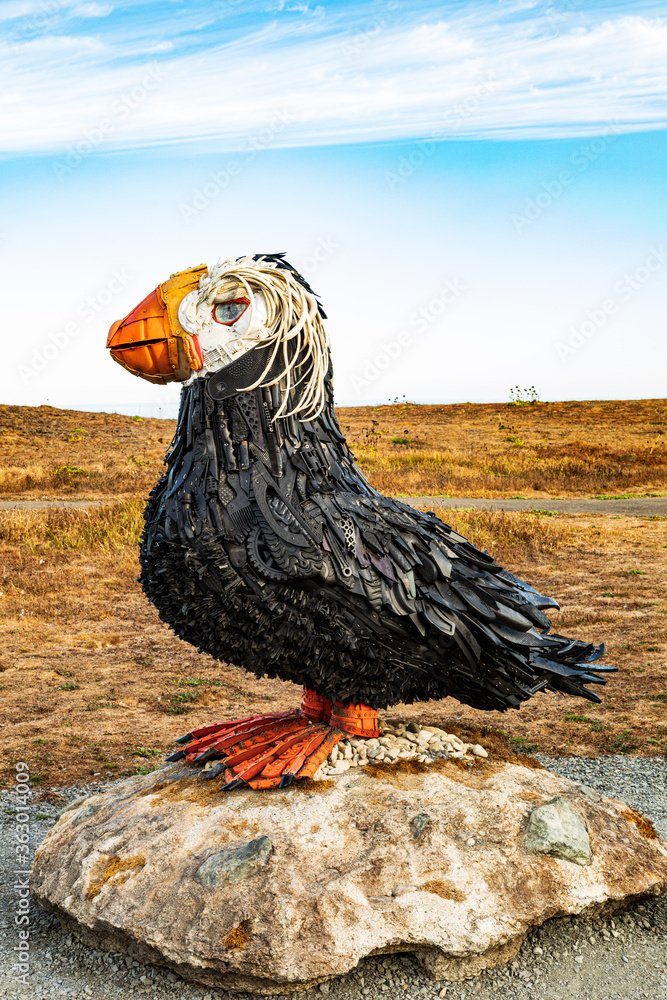 Vertical Image - Tufted Puffin sculpture made of plastic trash that's ...