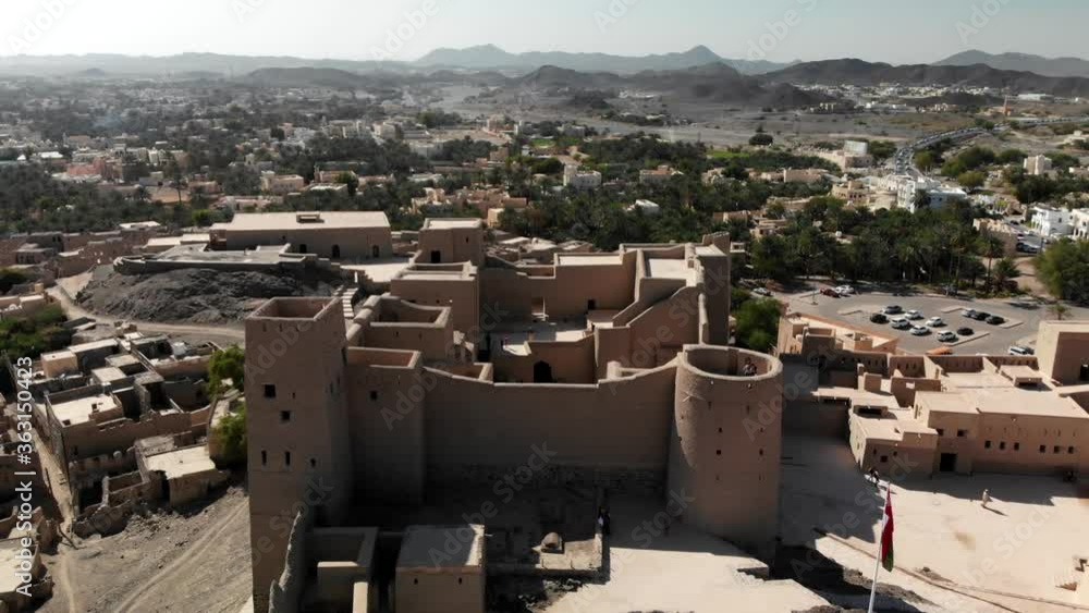 Overhead view of Hisn Tamah, also called Bahla fort, and the city of ...