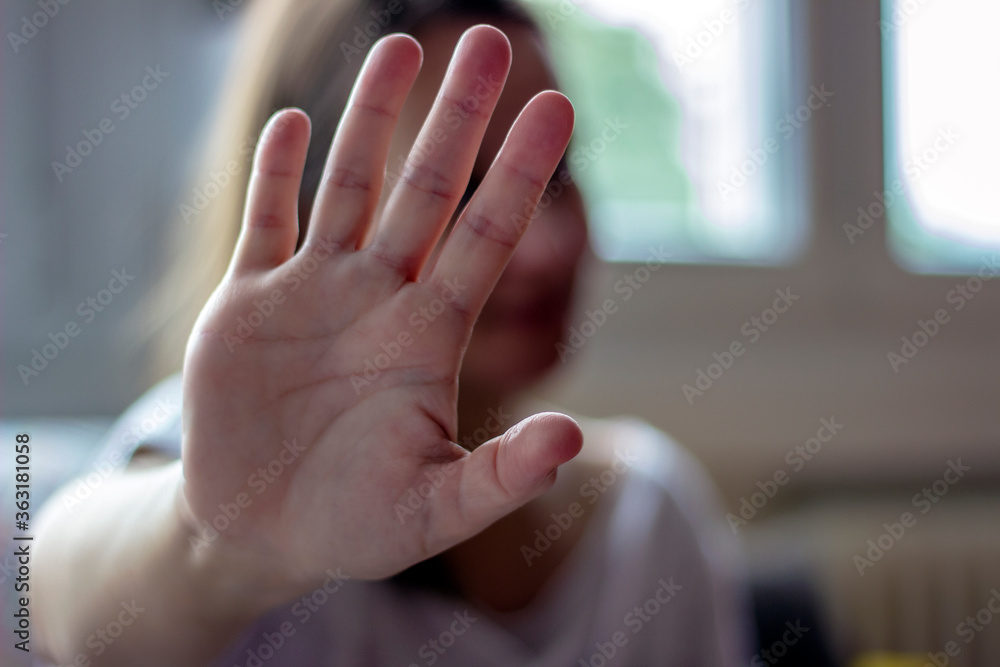 Woman making stop hand signal. Image against violence, abuses, drugs ...