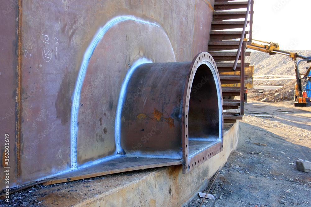 View of the clean out manhole of the oil storage tank with floating ...