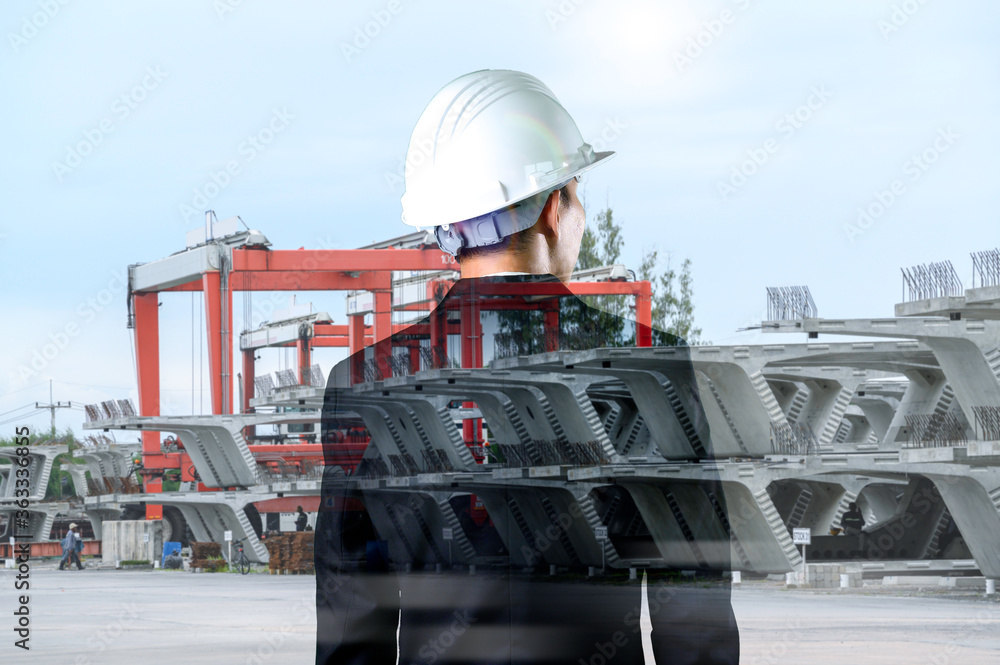 Engineer supervising the stock of prefabricated parts, bridge girder ...