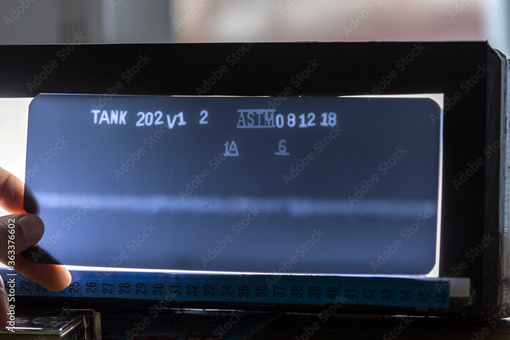 View of the industrial radiography of the weld metal with porosities ...