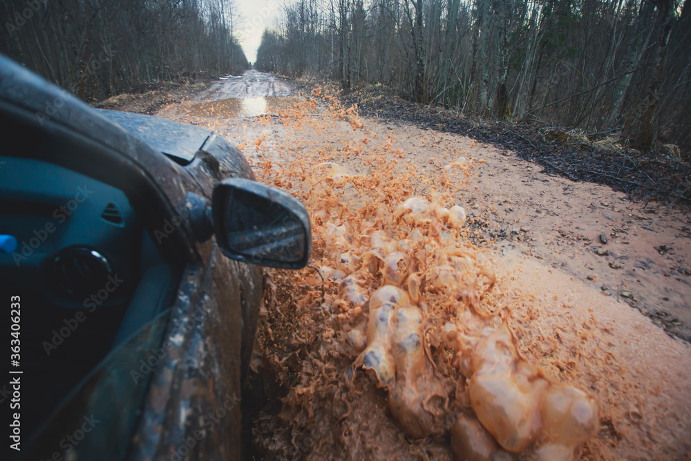 Suv offroad 4wd car rides through muddy puddle, off-road track road ...