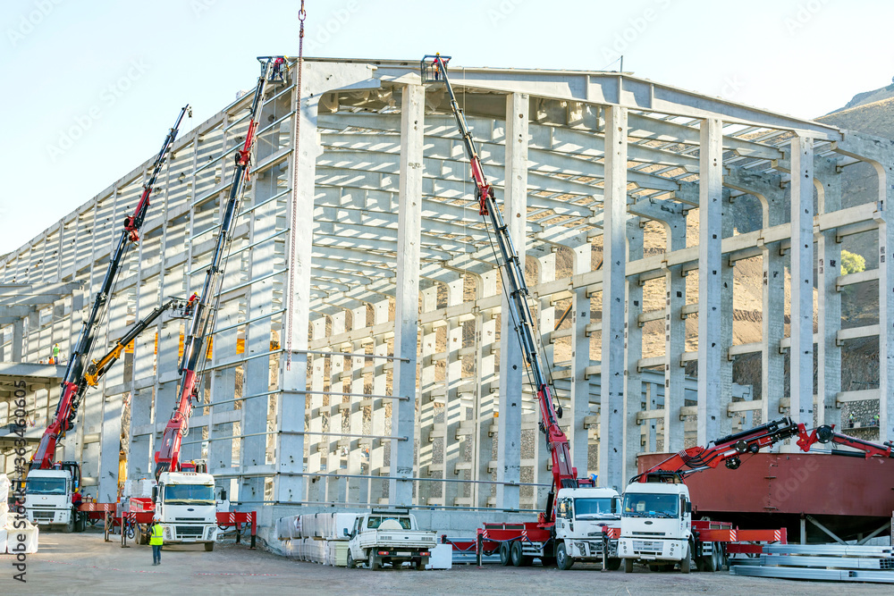 View of the hiab or hi-up cranes in the new construction plant. (Hiab ...