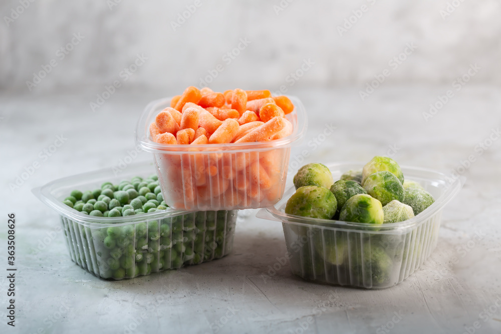 Frozen vegetables such as green peas, brussels sprouts and baby carrot ...