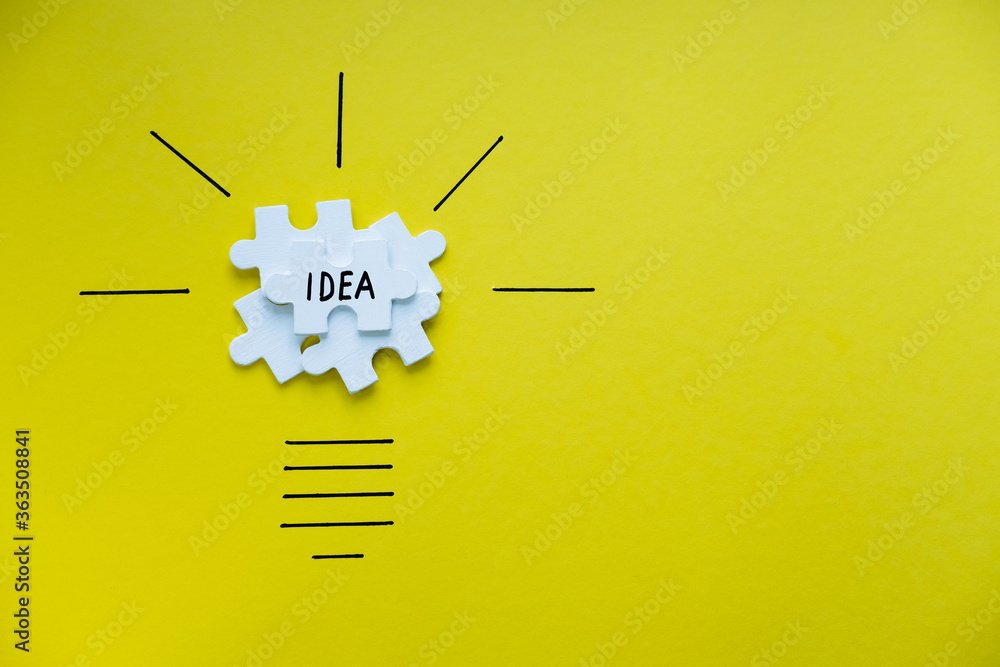 Light bulb over yellow background in vision and idea conceptual image ...