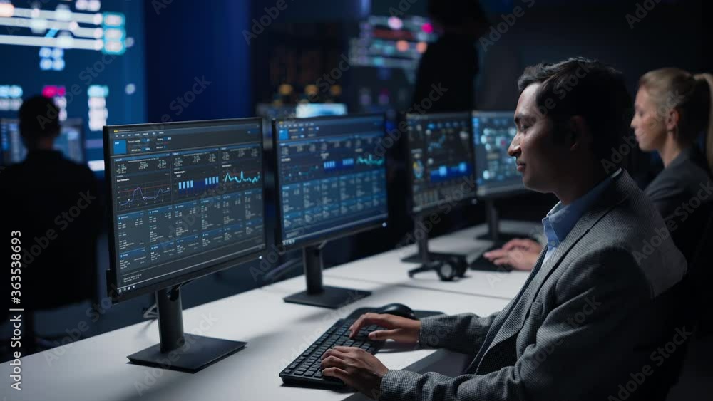 Vidéo Stock Confident Male Data Scientist Works on Personal Computer in ...