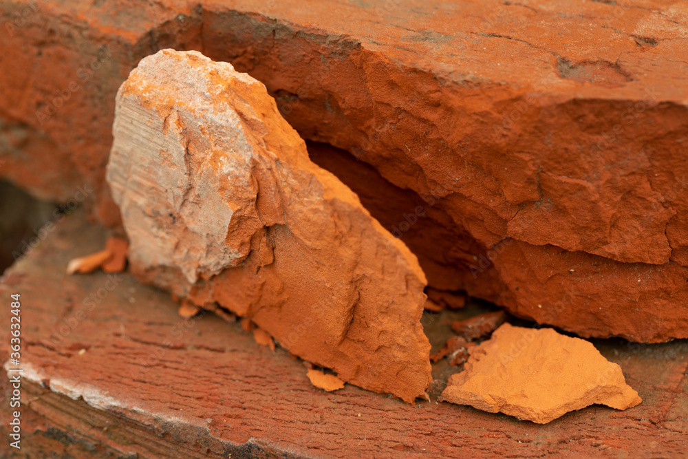 Chipped clay red brick. Cracked clay brick. Old cracked clay brick ...