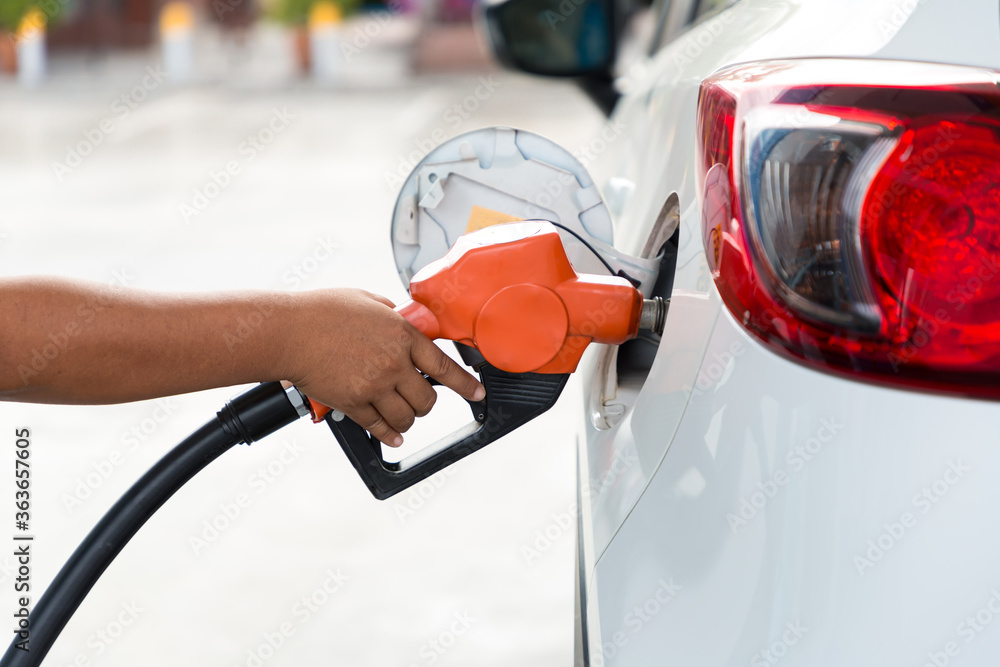 Man Refill and filling Oil Gas Fuel at station.Gas station - refueling ...