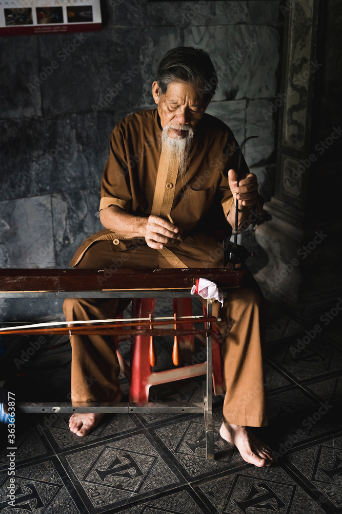 Monk Inside A Temple In Vietnam Stock Photo | Adobe Stock