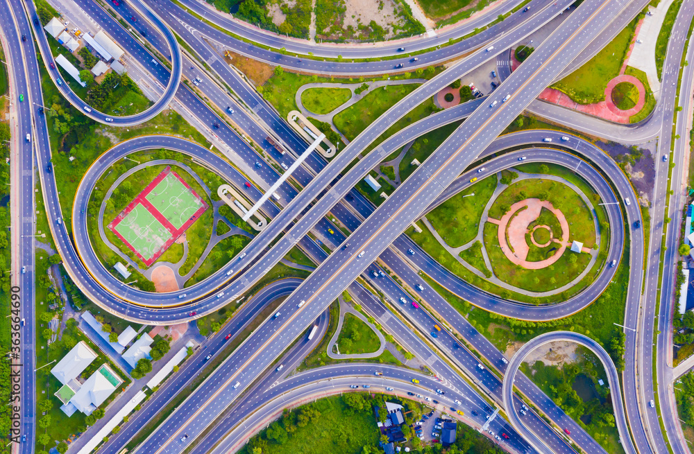 Aerial view footage of car traffic of expressway and intersection in ...