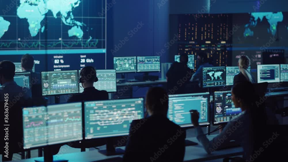 Team of Professional Computer Data Science Engineers Work on Desktops ...