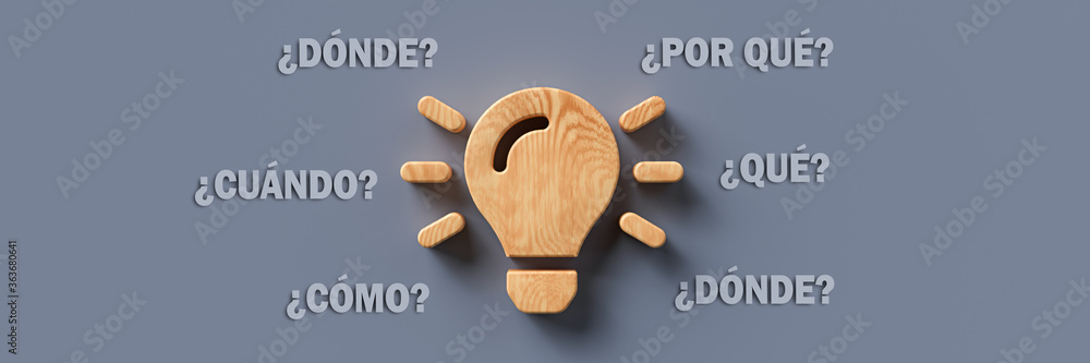 wooden lightbulb with the Spanish words for WHEN, WHAT, WHERE, WHO, WHY ...