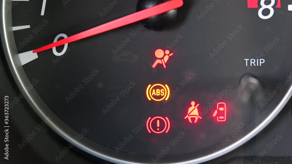 Red arrow and Indicators on the tachometer in the car. The vehicle ...