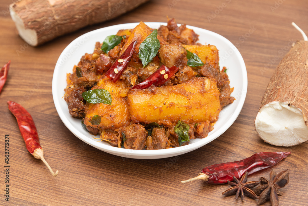 Popular traditional South Indian food Kappa or tapioca biryani hot and ...