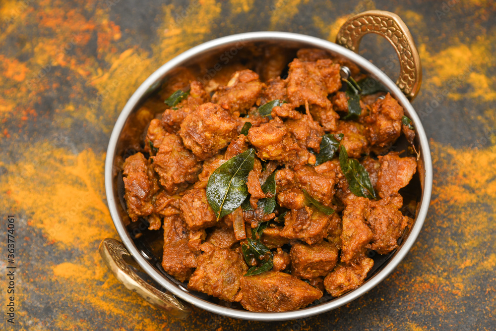 Beef fry curry roast mutton curry meat dish Kerala, India. Hot and ...