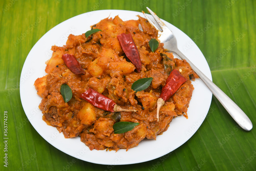 Popular traditional South Indian food Kappa or tapioca biryani hot and ...