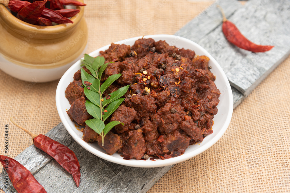 Beef fry curry roast mutton curry meat dish Kerala, India. Hot and ...