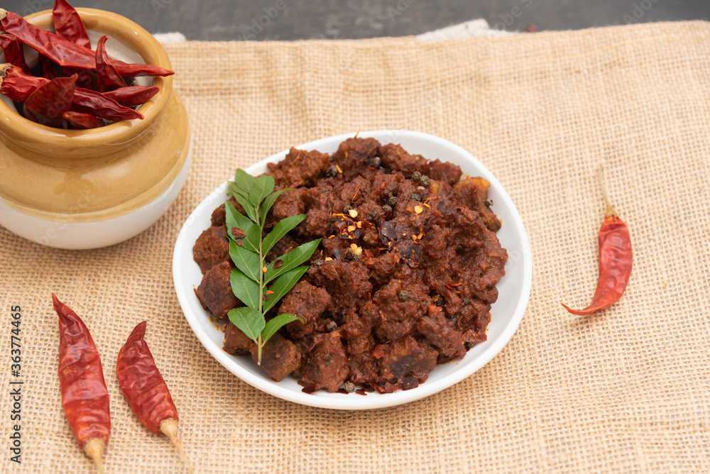 Beef fry curry roast mutton curry meat dish Kerala, India. Hot and ...