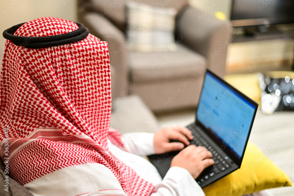 Arabic man from Saudi Arabia working at home to protect him self from ...