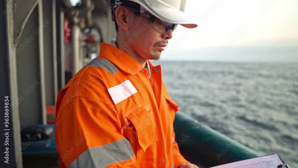 Filipino deck Officer on deck of offshore vessel or ship , wearing PPE ...