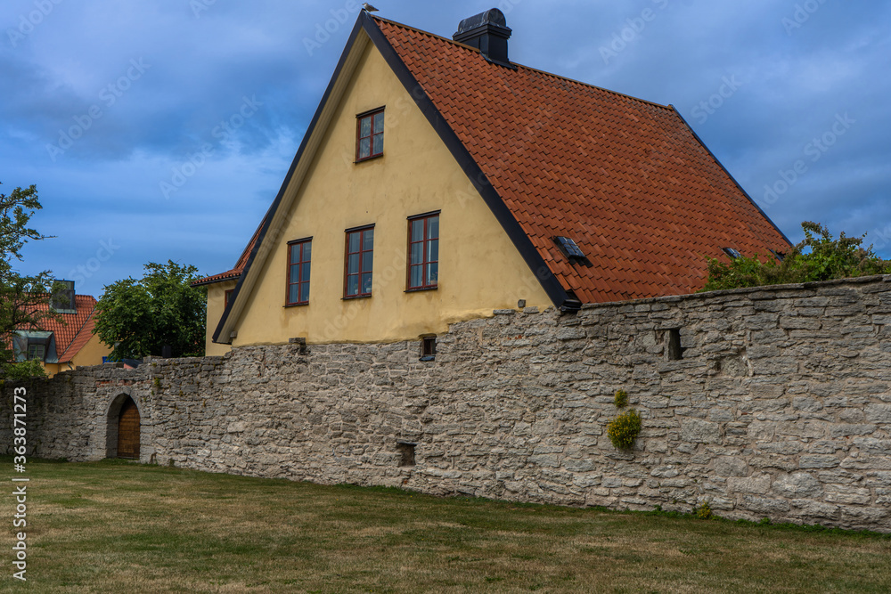 Ancient houses in Visby. Photo of medieval architecture. Sweden ...