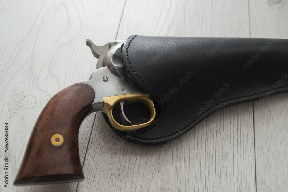 Photo & Art Print Old black powder cap and ball gun in leather holster ...