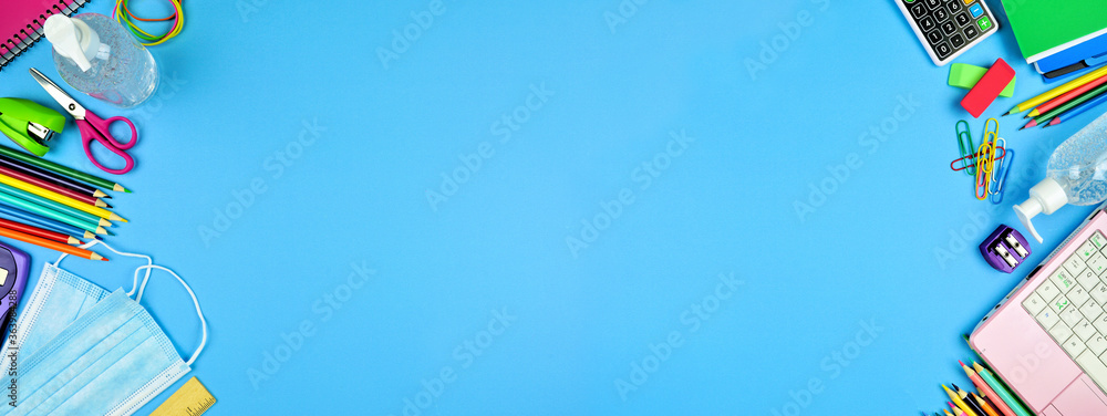 School supplies and COVID 19 prevention items. Double border on a blue ...