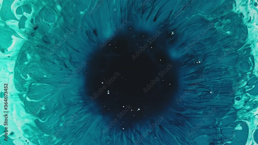 Paint splash in water. Fantasy eye. Blue fluid splatter with dark ...